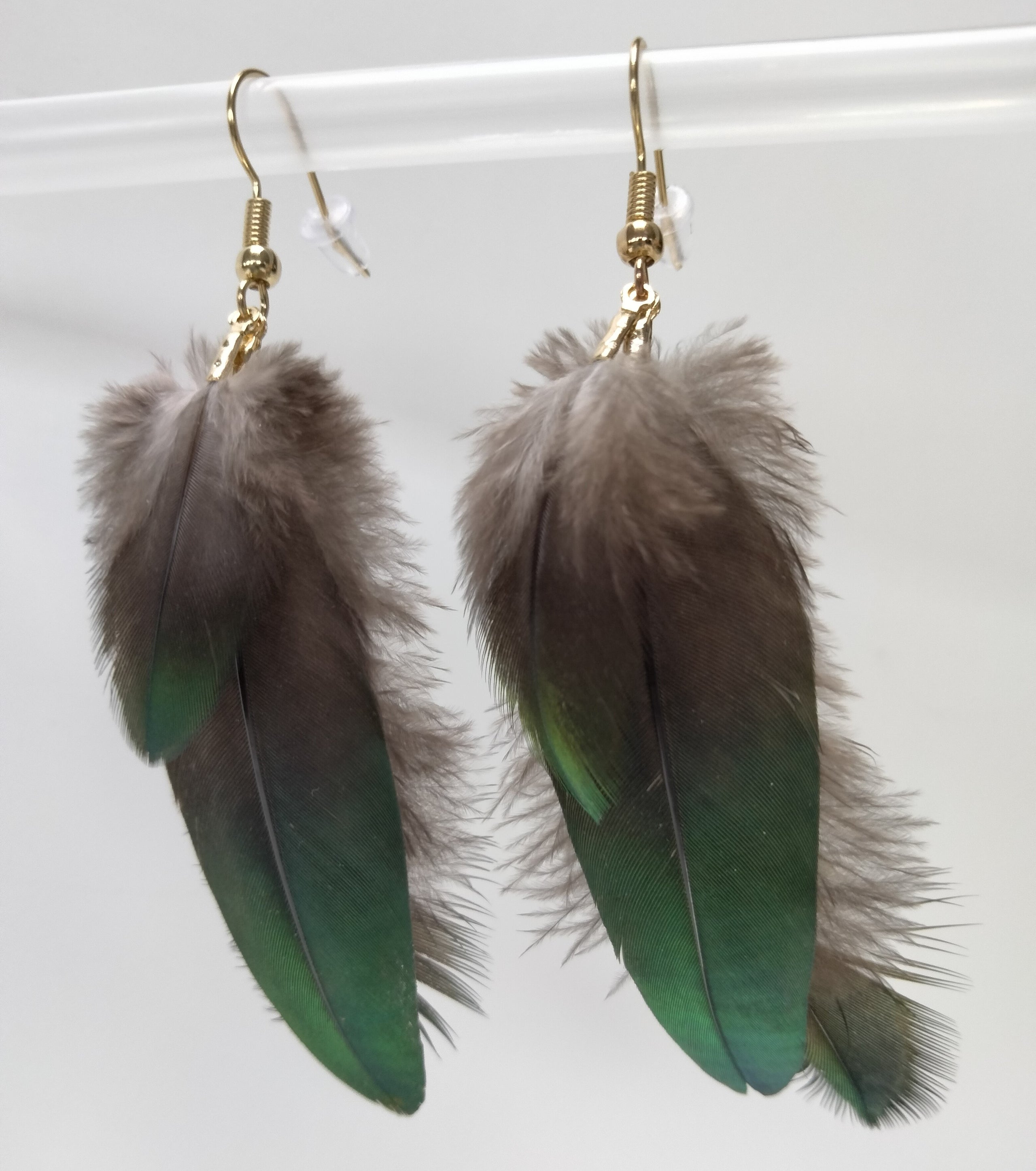 Bird feather earrings store